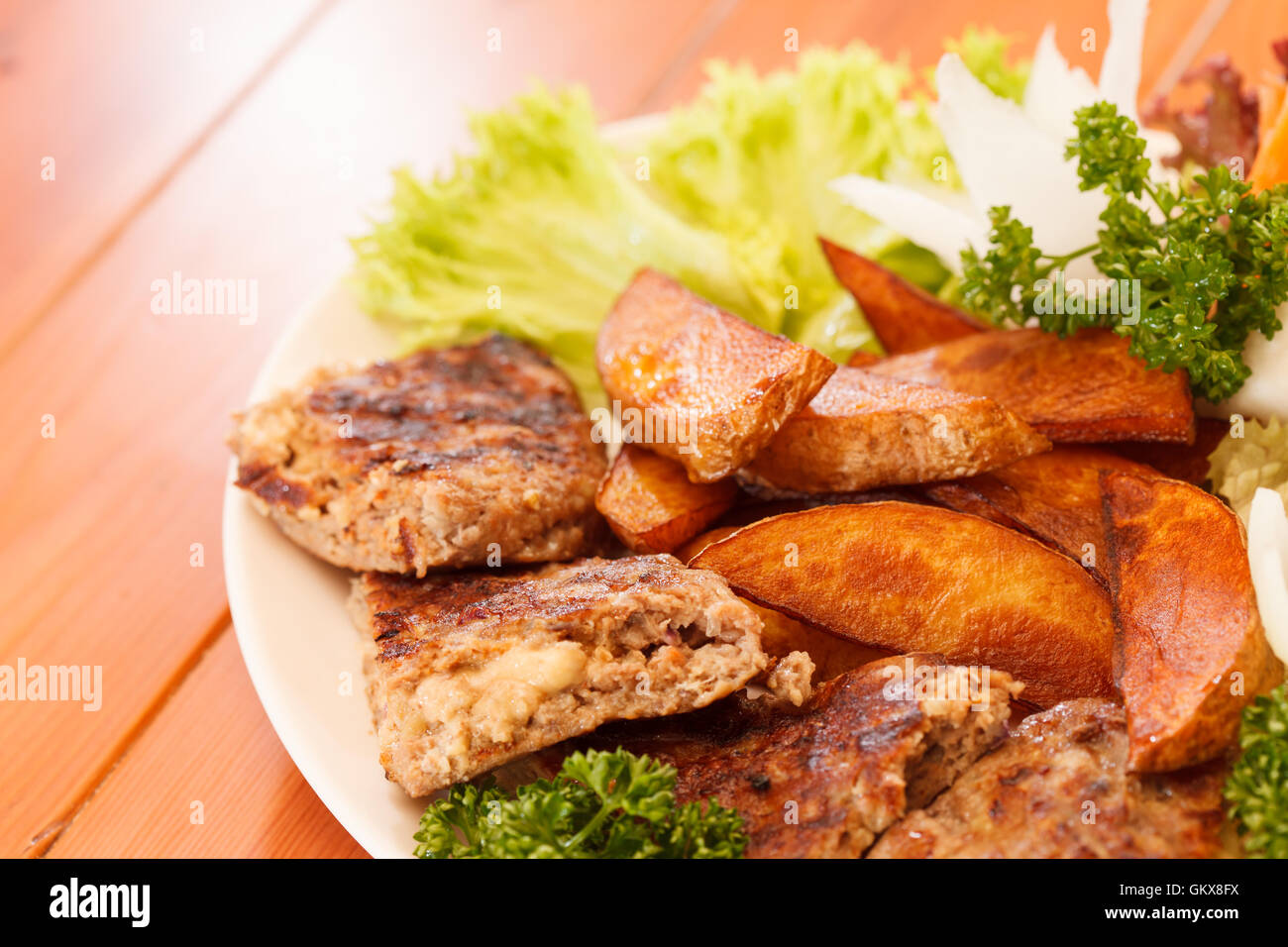 grilled ribs with vegetables Stock Photo - Alamy