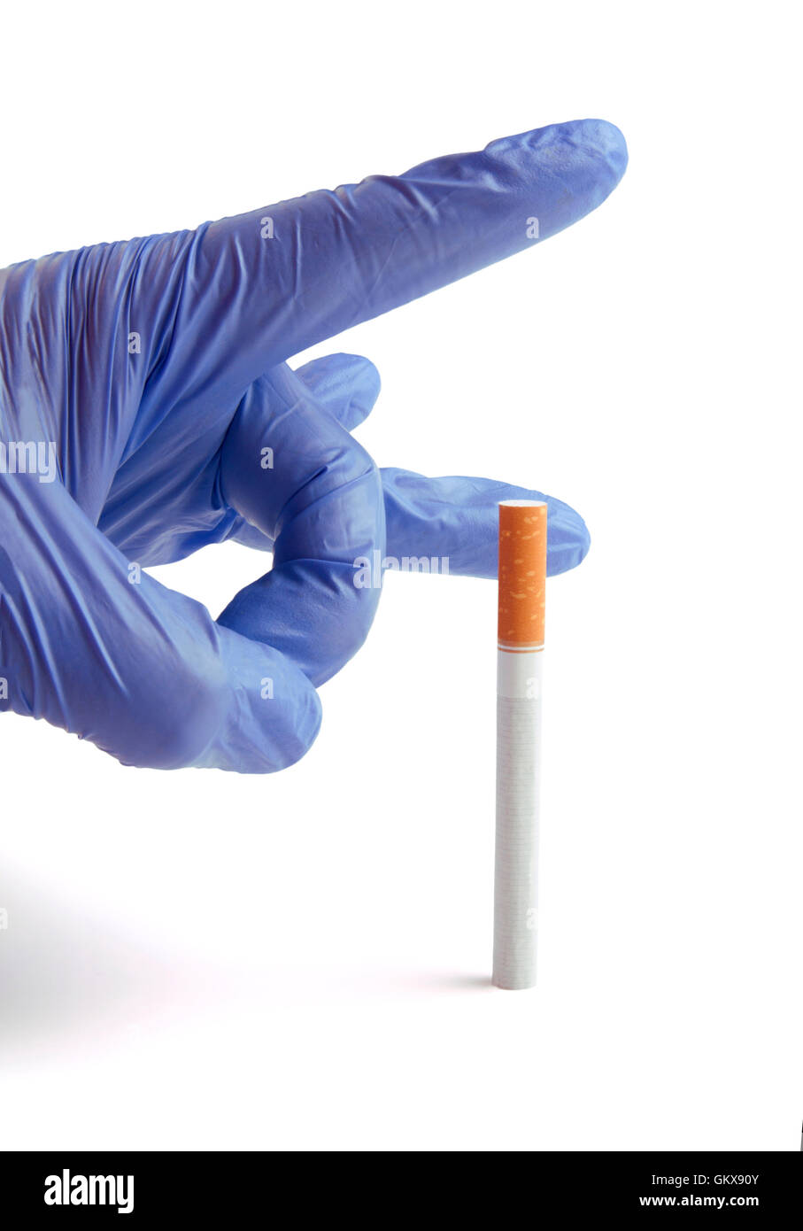 Gloved hand throwing cigarette Quit smoking metaphor Stock Photo - Alamy