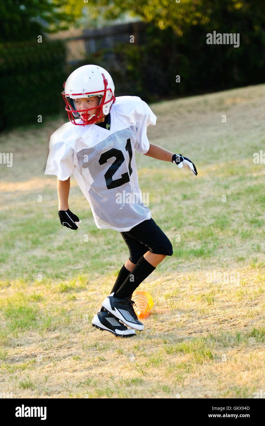 Youth football player Stock Photo - Alamy