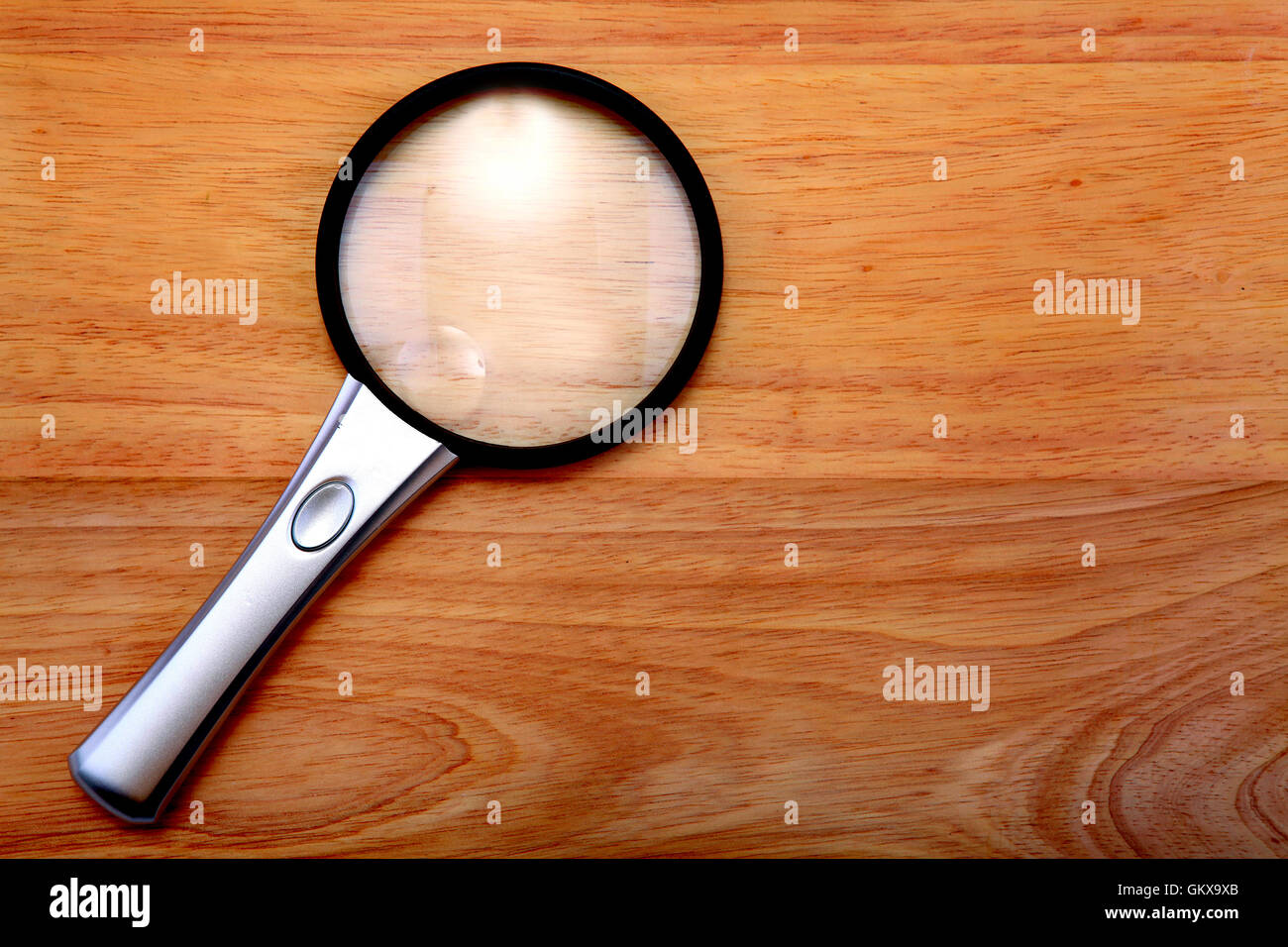 Loupe On The Table Stock Photo - Alamy