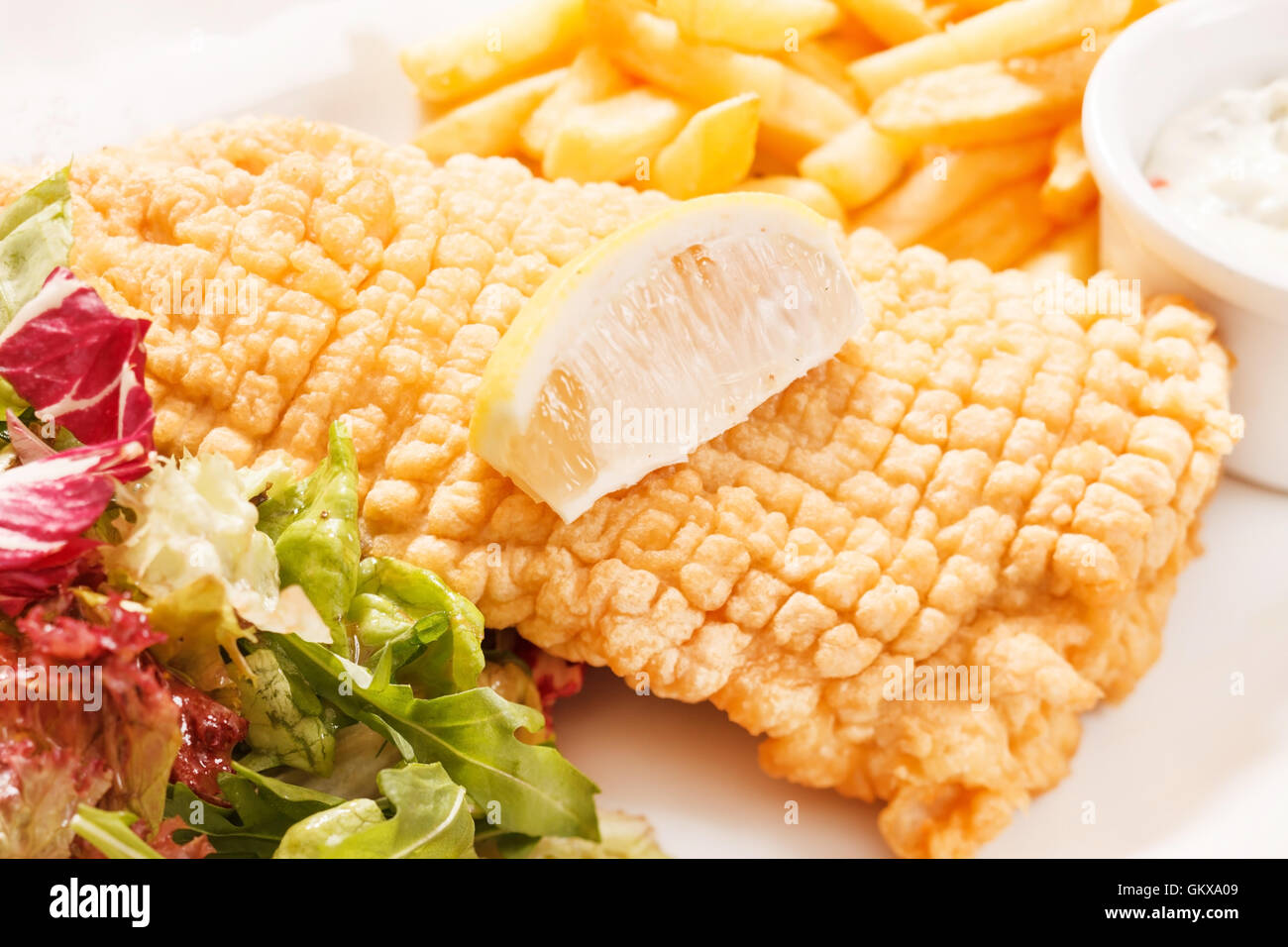 fish with french fries potatoes Stock Photo - Alamy
