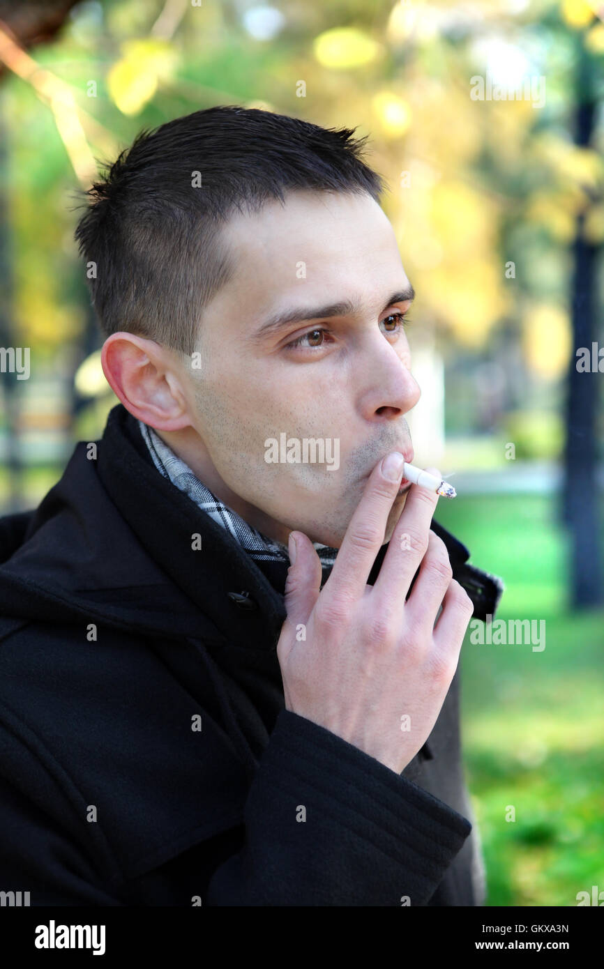 Man Smoking Outdoor Stock Photo - Alamy