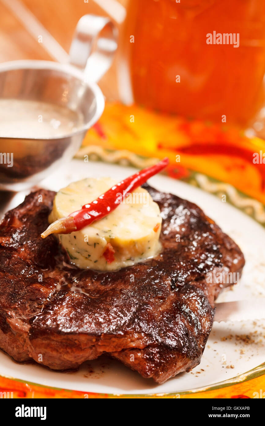 Beef Steak with Butter Stock Photo - Alamy