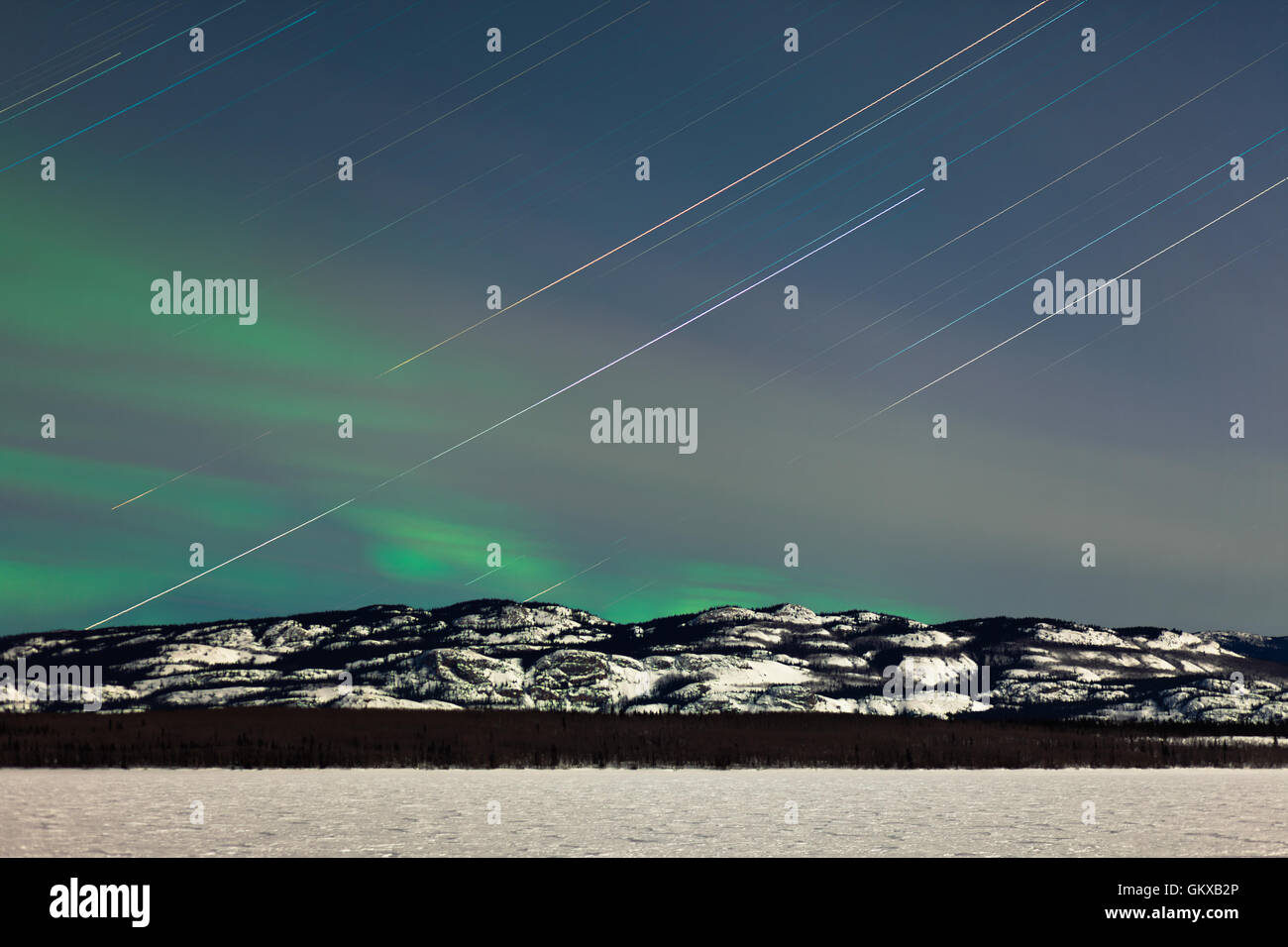 Northern lights stars startrails hi-res stock photography and images ...