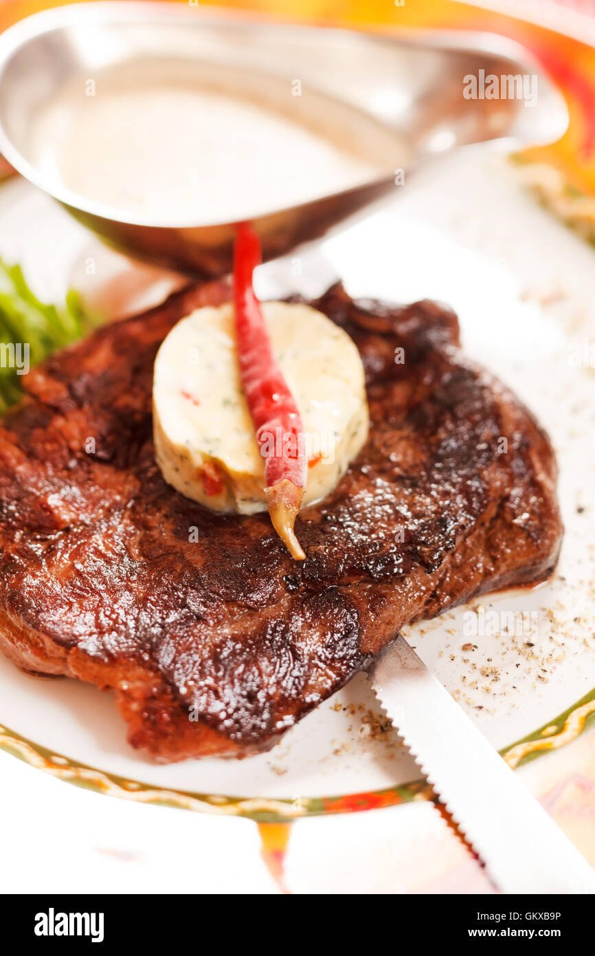 Beef Steak with Butter Stock Photo - Alamy