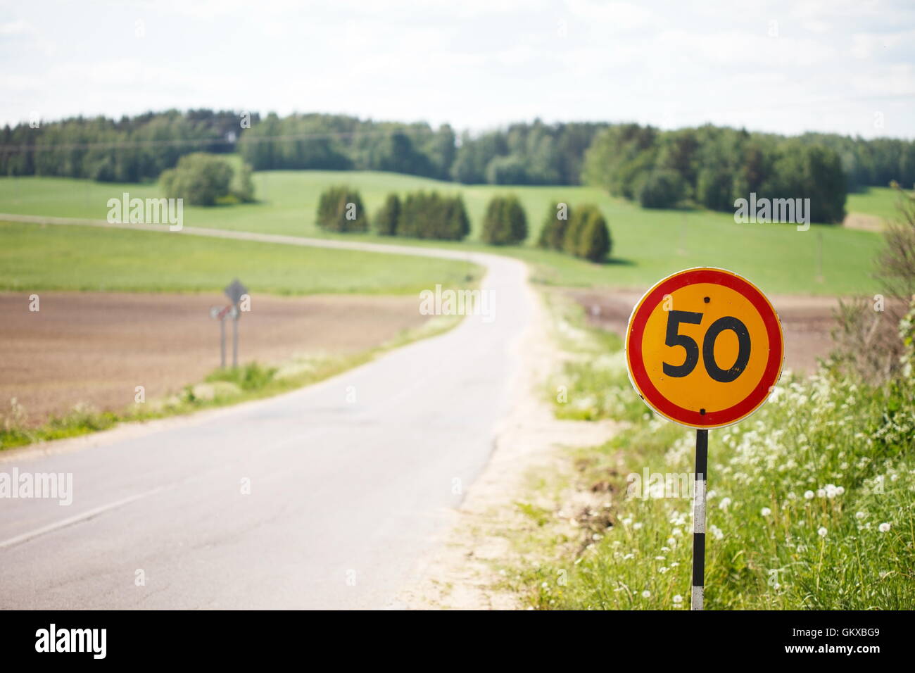 limit sign near road Stock Photo - Alamy