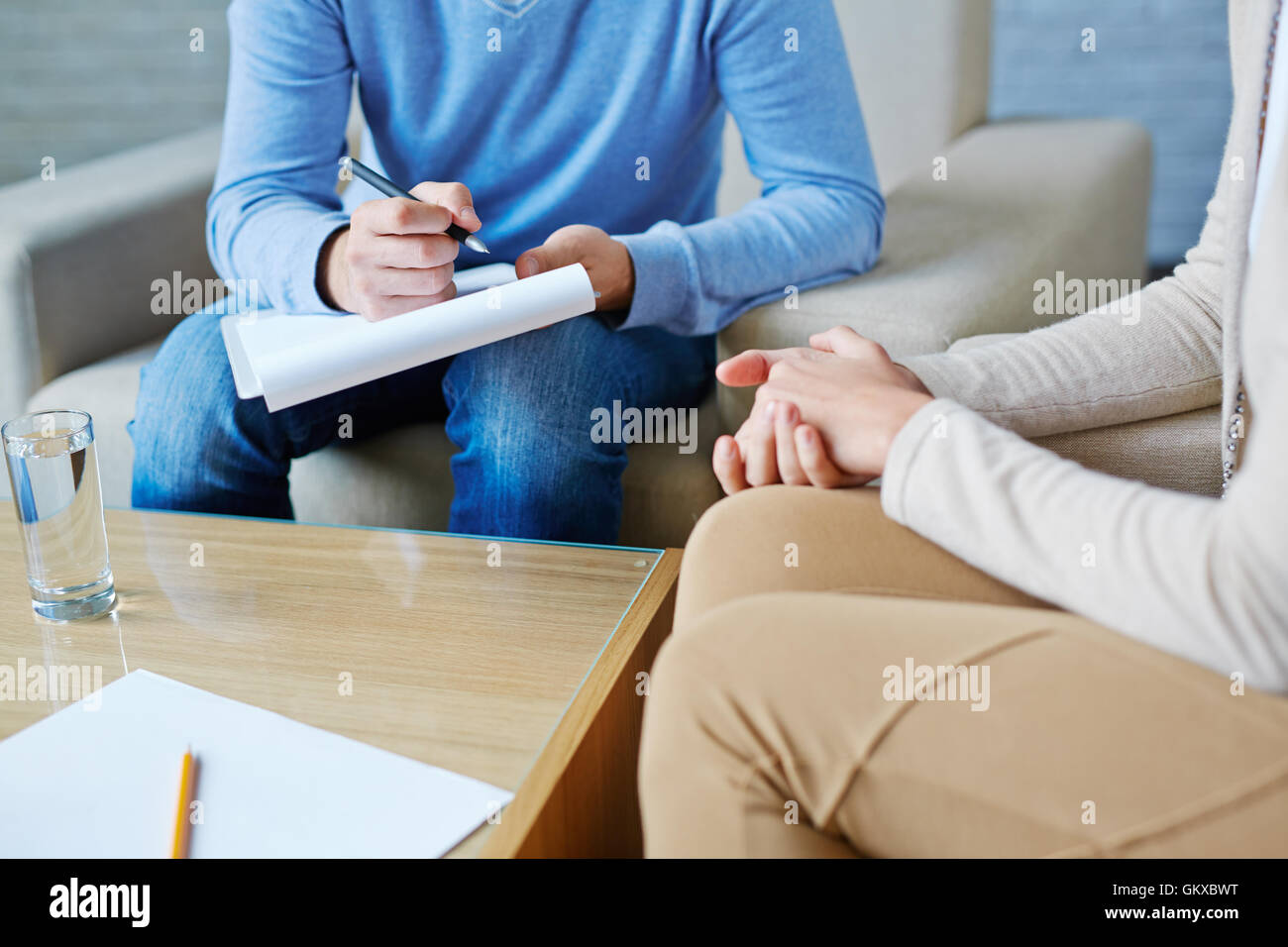Young woman visiting her psychologist Stock Photo - Alamy