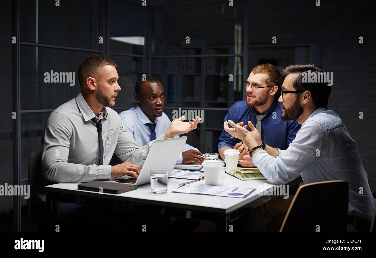 Young men at work hi-res stock photography and images - Alamy
