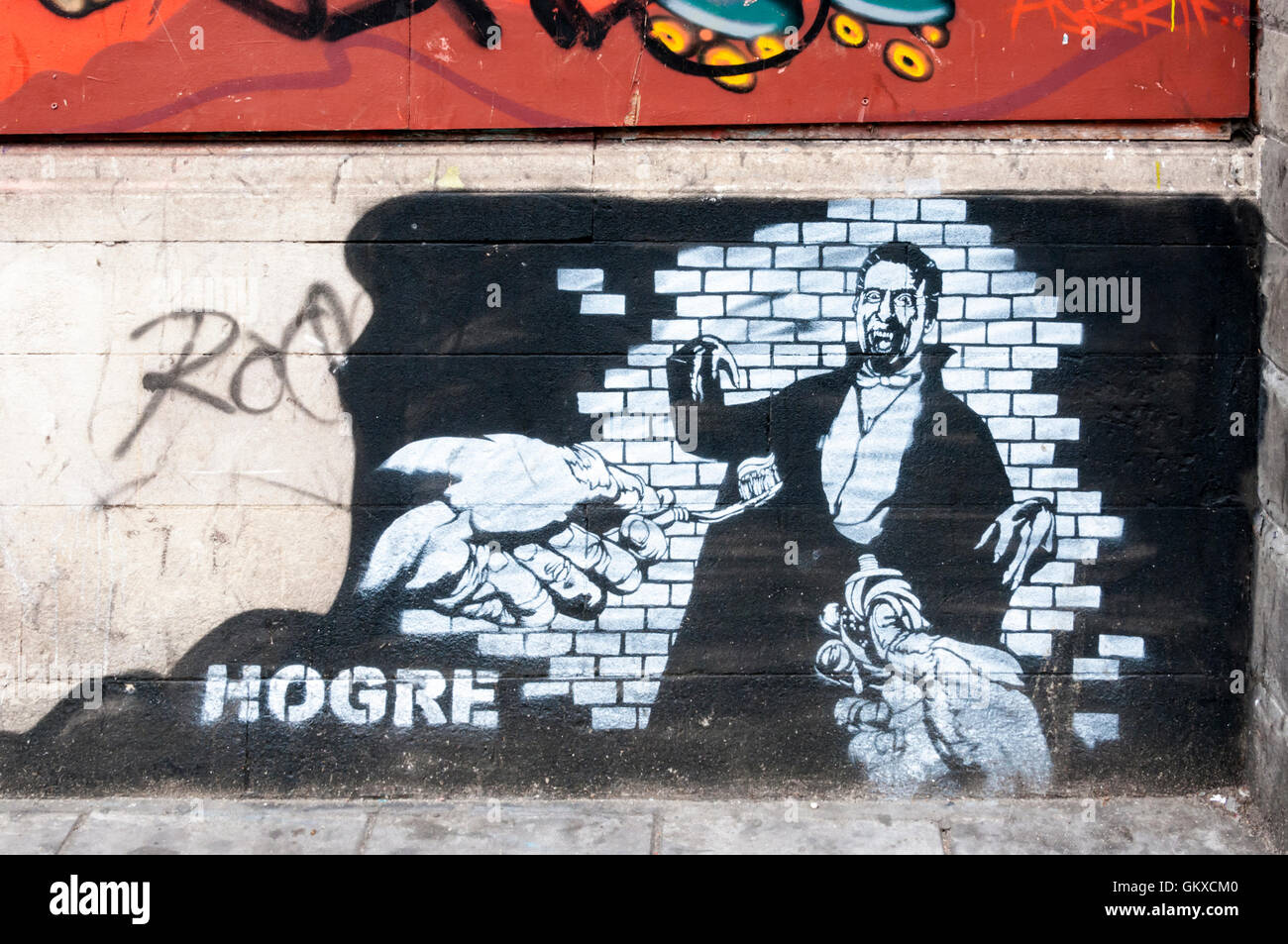 Graffiti by Hogre in Stokes Croft area of Bristol shows a vampire ...
