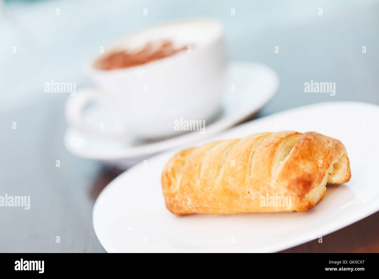 coffee with puff pastry Stock Photo - Alamy