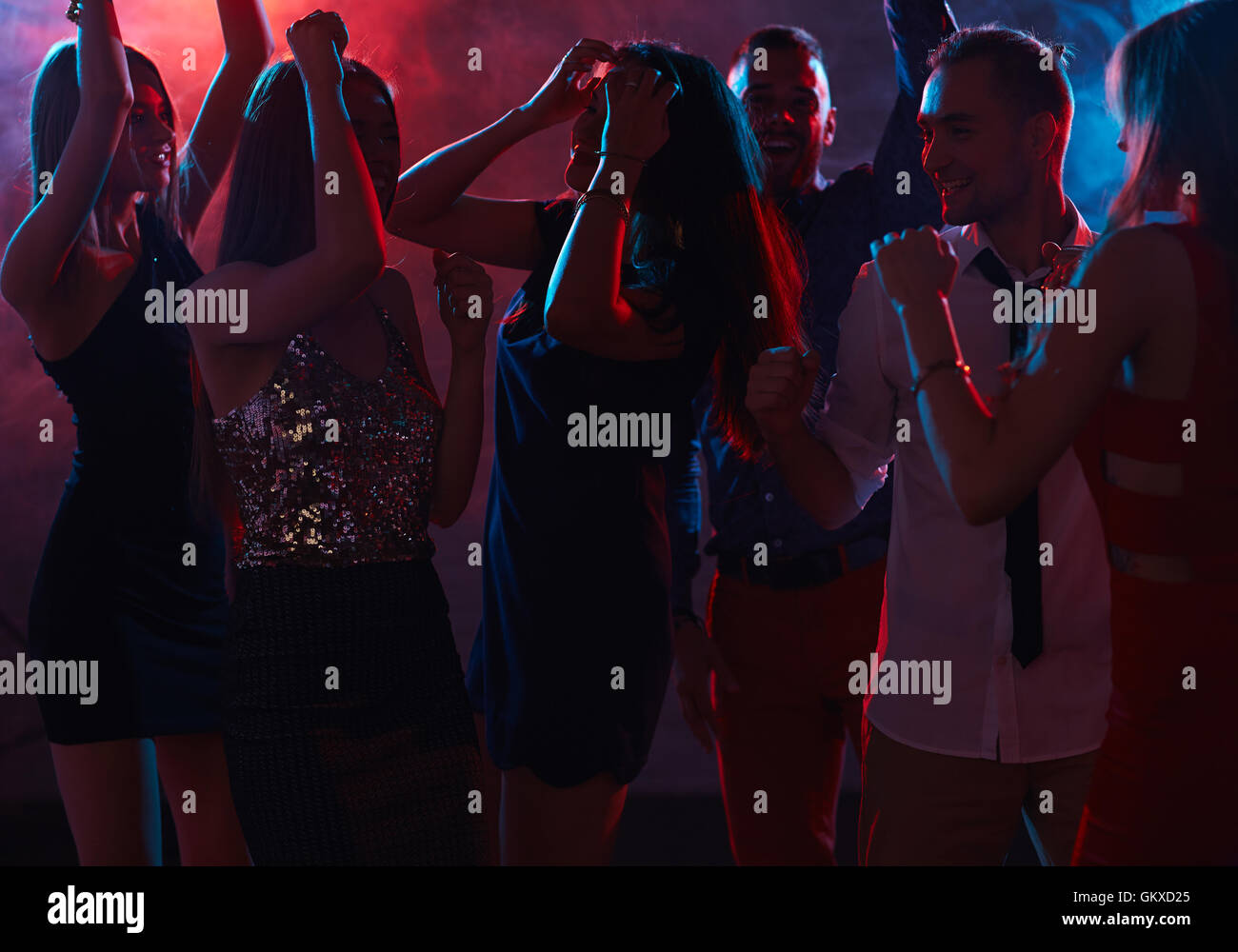 Happy girls dancing in nightclub hi-res stock photography and images ...