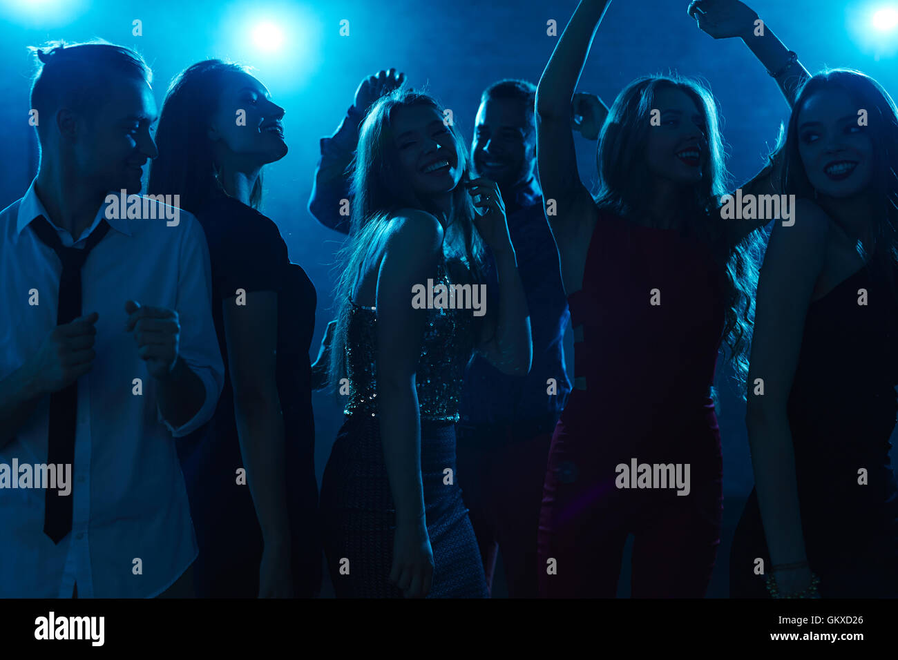 Group of posh friends dancing at party Stock Photo - Alamy