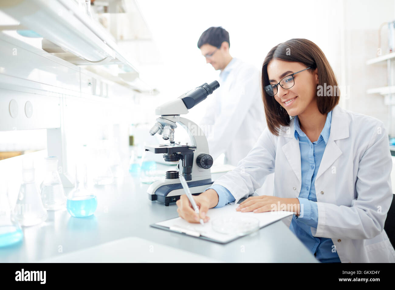 Scientist microscope notes hi-res stock photography and images - Alamy