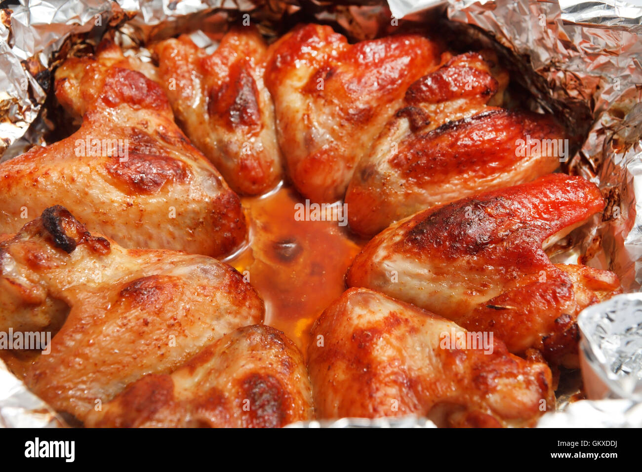 Basted chicken wings hi-res stock photography and images - Alamy