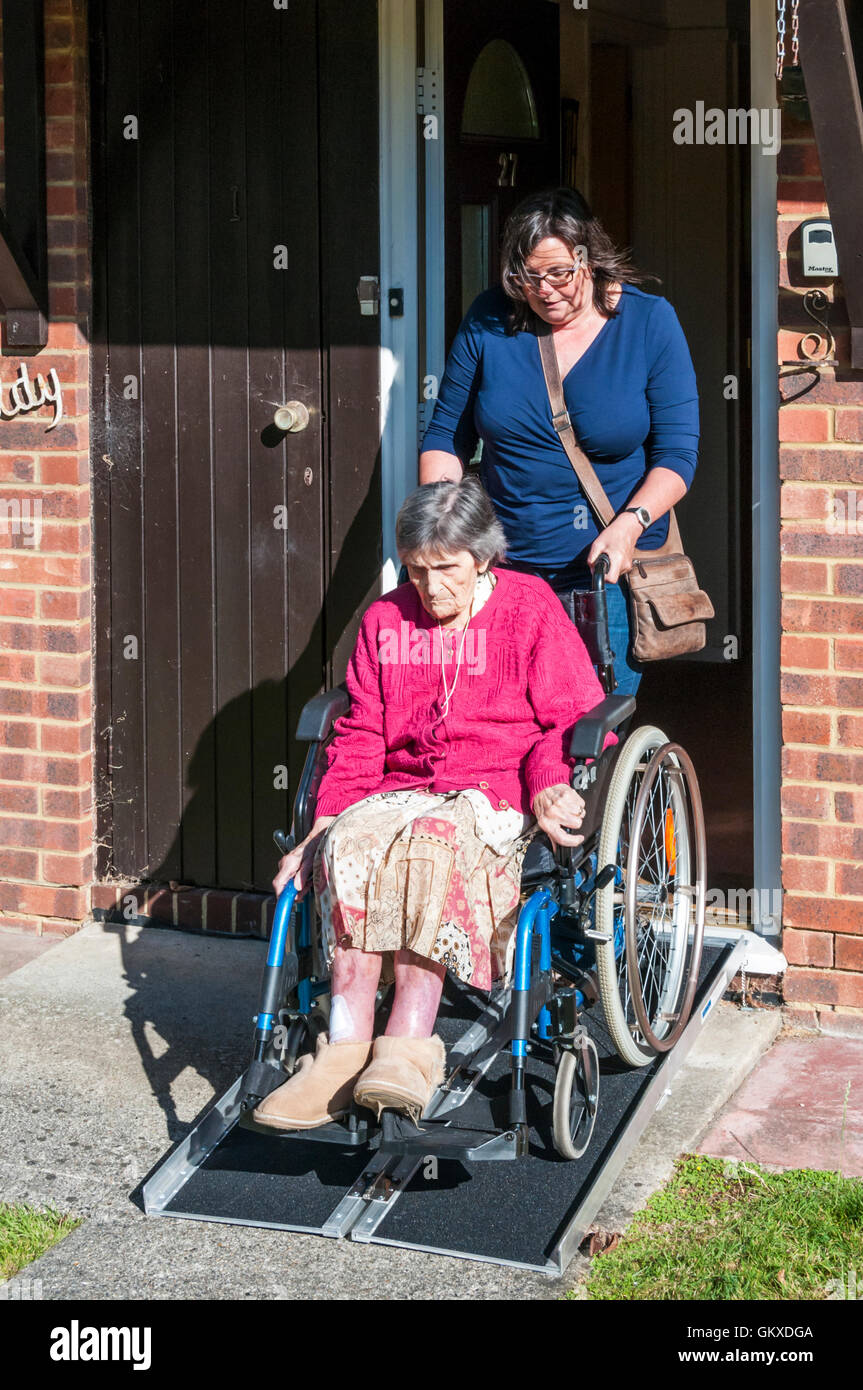 Elderly lady in wheelchair carer hi-res stock photography and images ...