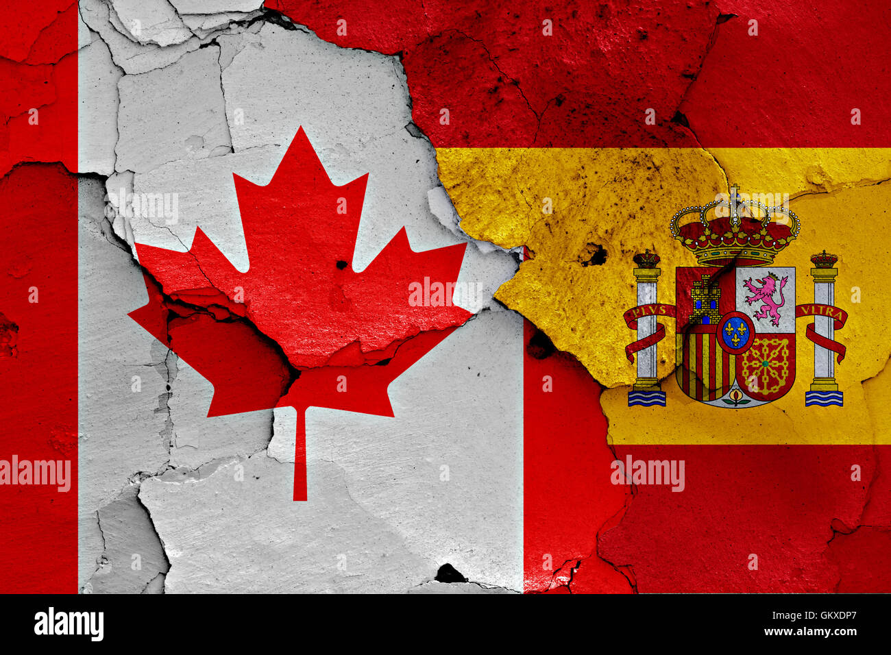 flags of Canada and Spain painted on cracked wall Stock Photo - Alamy