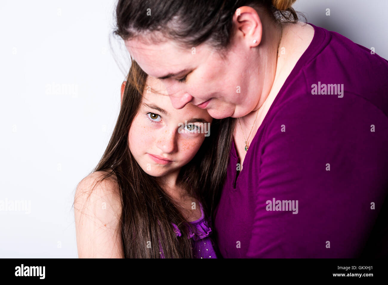 mother comforting her daughter Stock Photo - Alamy