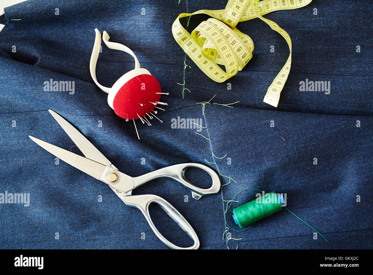 Group of tailoring objects on textile Stock Photo - Alamy