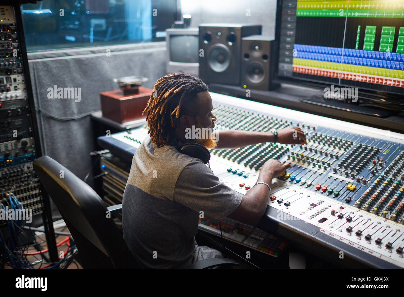 Professional dj working in studio of sound Stock Photo - Alamy