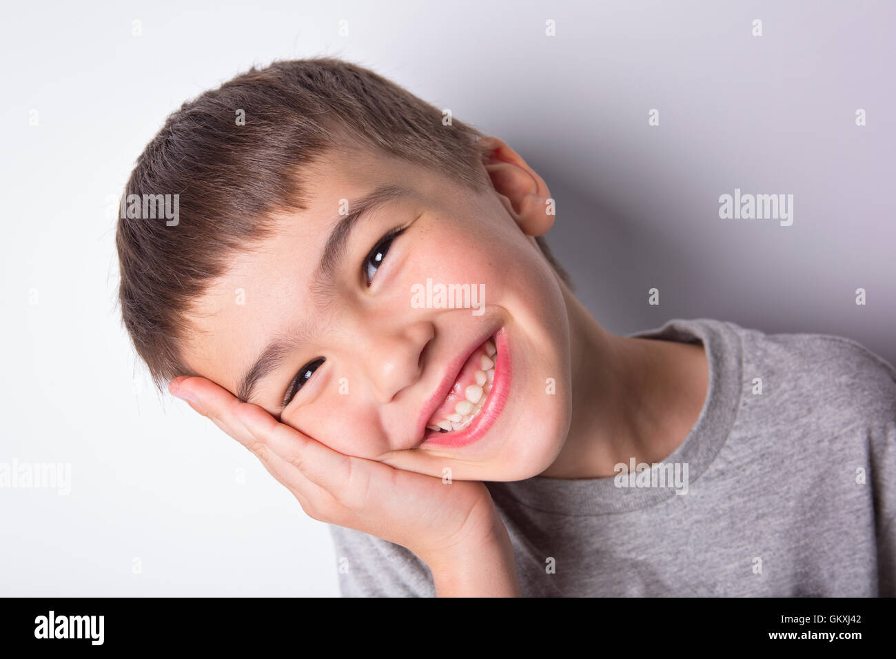 Adorable kid over with background Stock Photo - Alamy