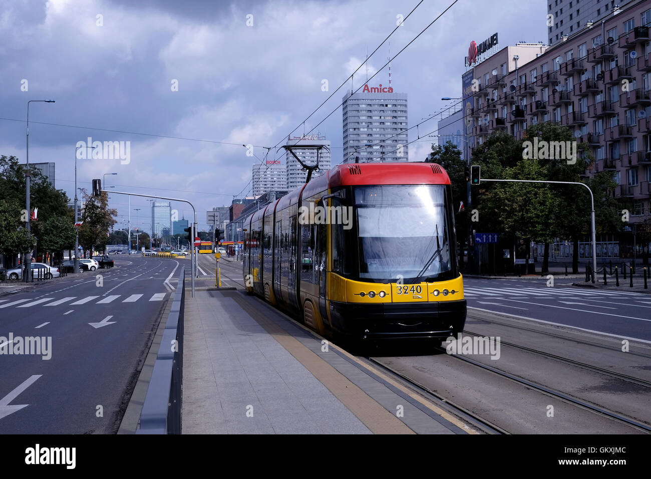 Tram passing through central Warsaw in Poland Stock Photo - Alamy