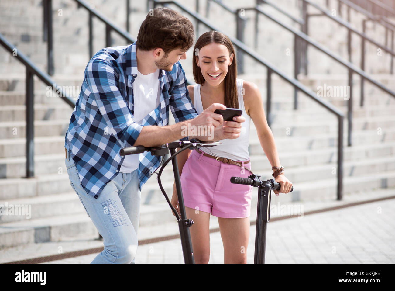 Positive friends resting together Stock Photo - Alamy
