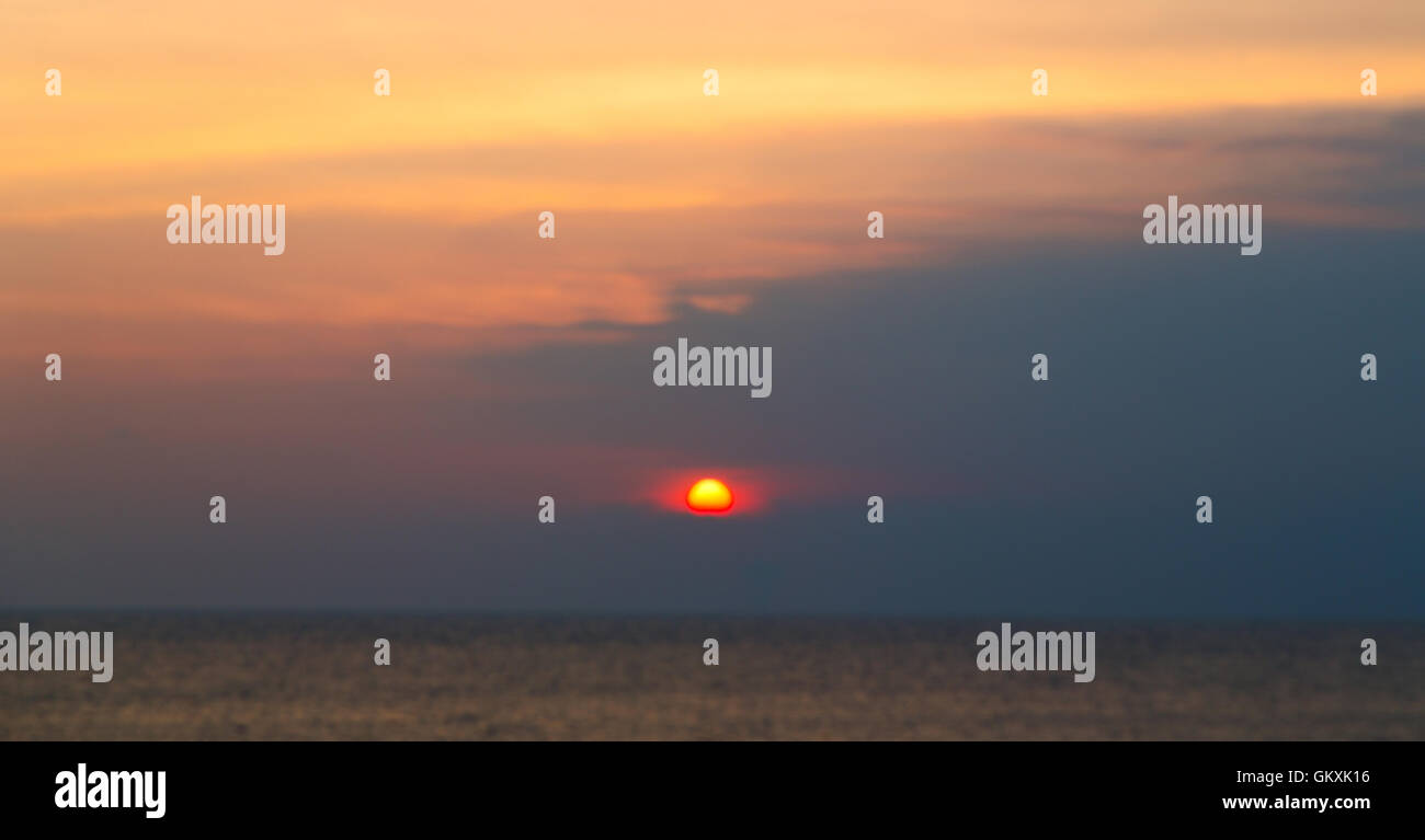 the blurred sun falling down arabian sea ocean in oman coastline Stock ...