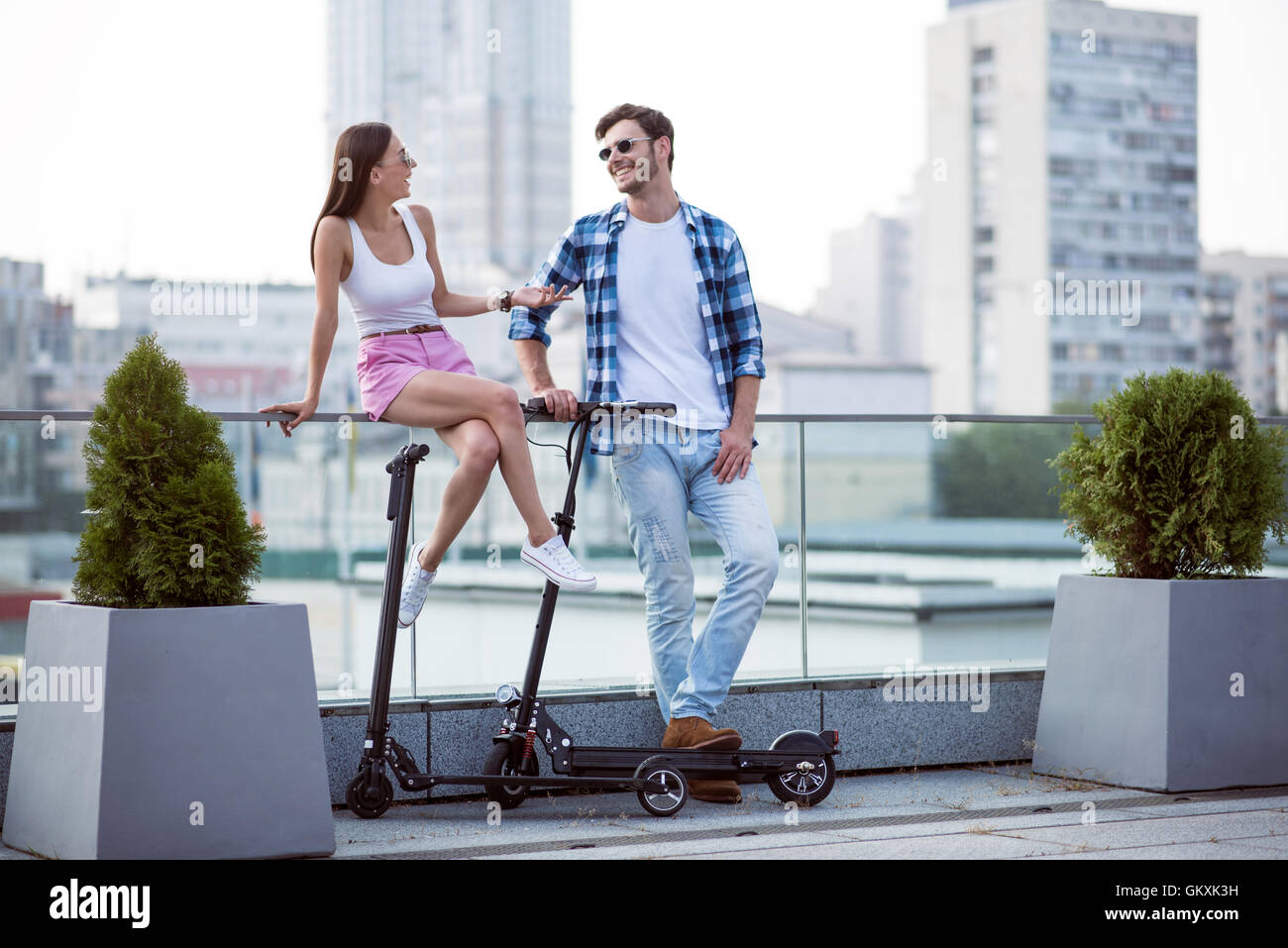 Positive friends talking Stock Photo - Alamy