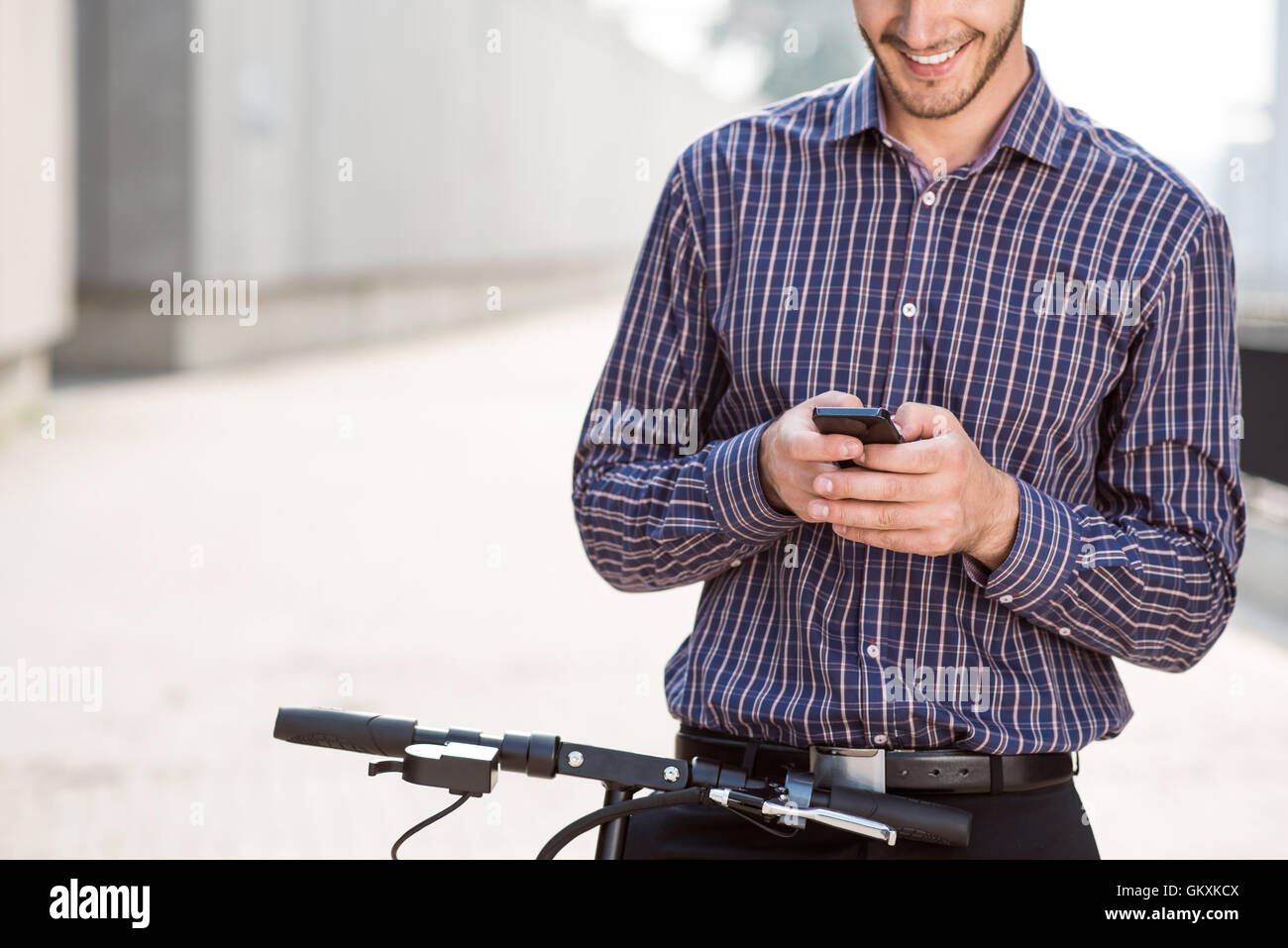 Man using e scooter mobile phone city hi-res stock photography and ...