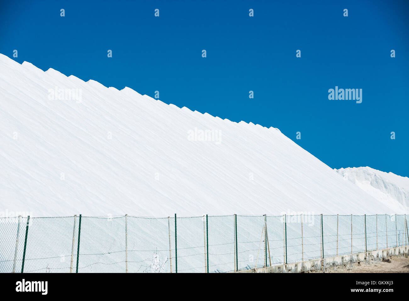 Sea salt production and storage Stock Photo - Alamy