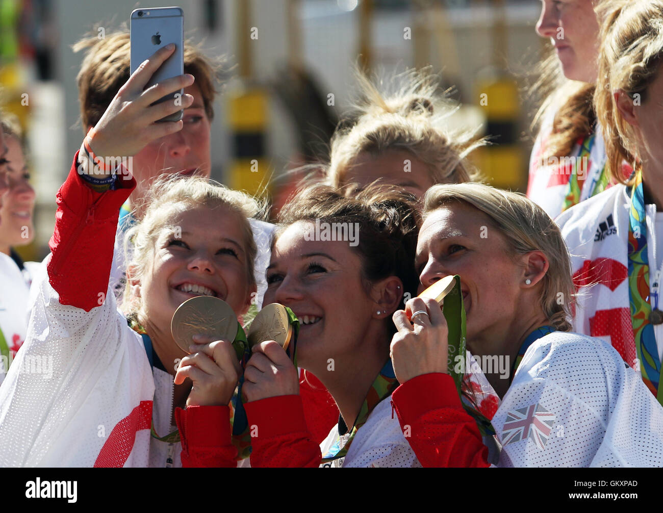 Members of the Team GB squad pose for pictures at Heathrow Terminal 5 ...