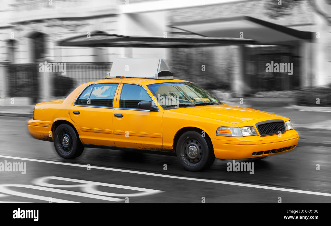 Yellow cab in Manhattan in a rainy day. The taxicabs of New York City ...
