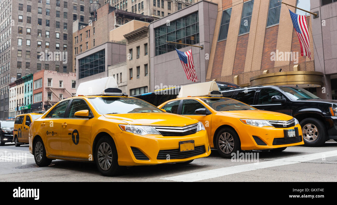 Yellow cabs in Manhattan, NYC. The taxicabs of New York City are widely ...
