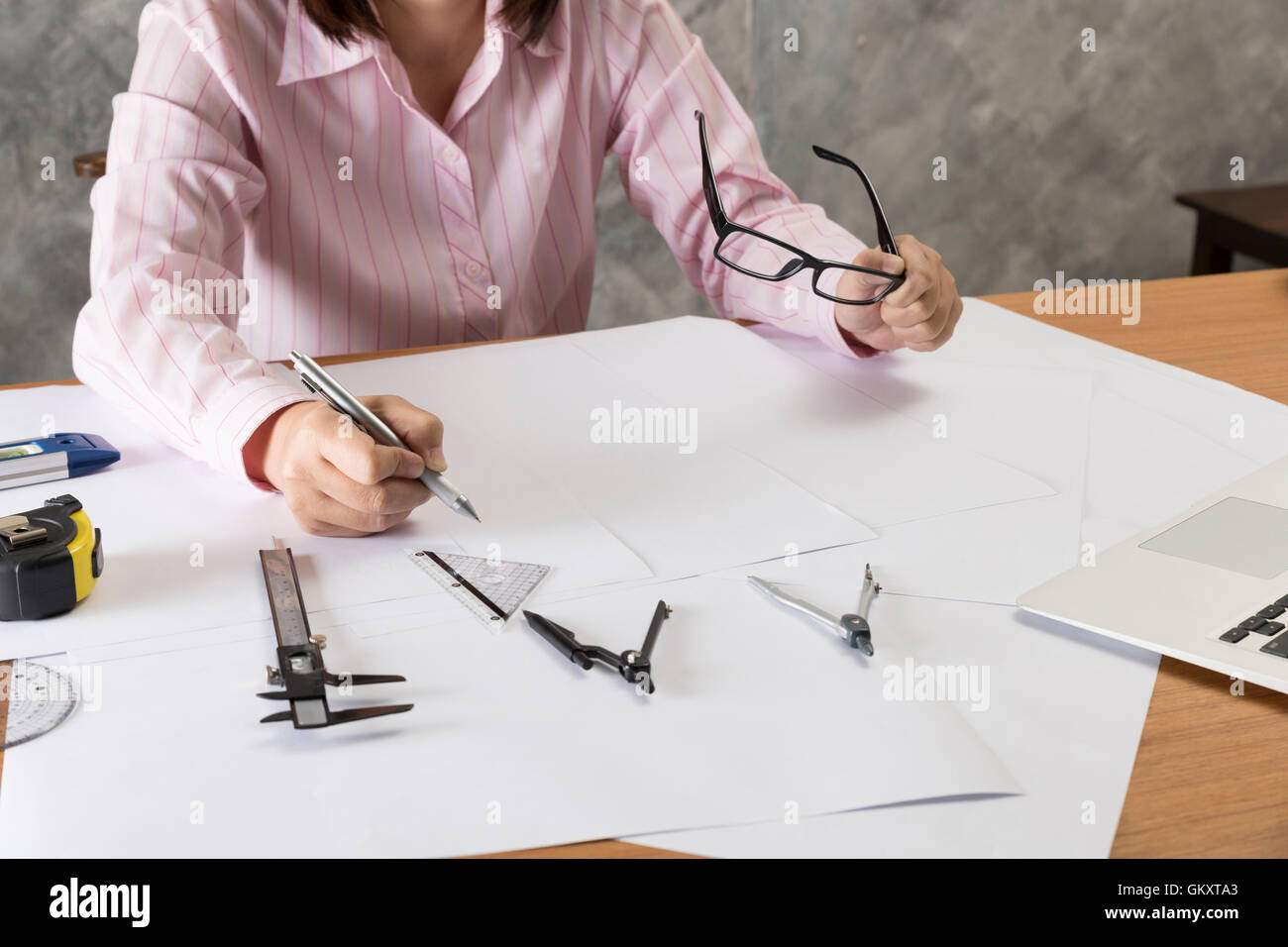 Architect working construction plan hi-res stock photography and images ...