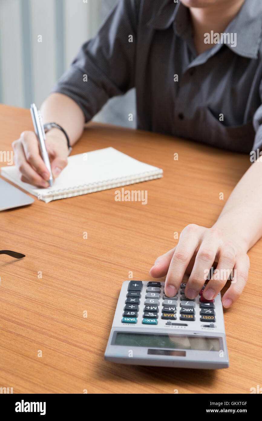 Calculator notepad pen eyeglasses hi-res stock photography and images ...