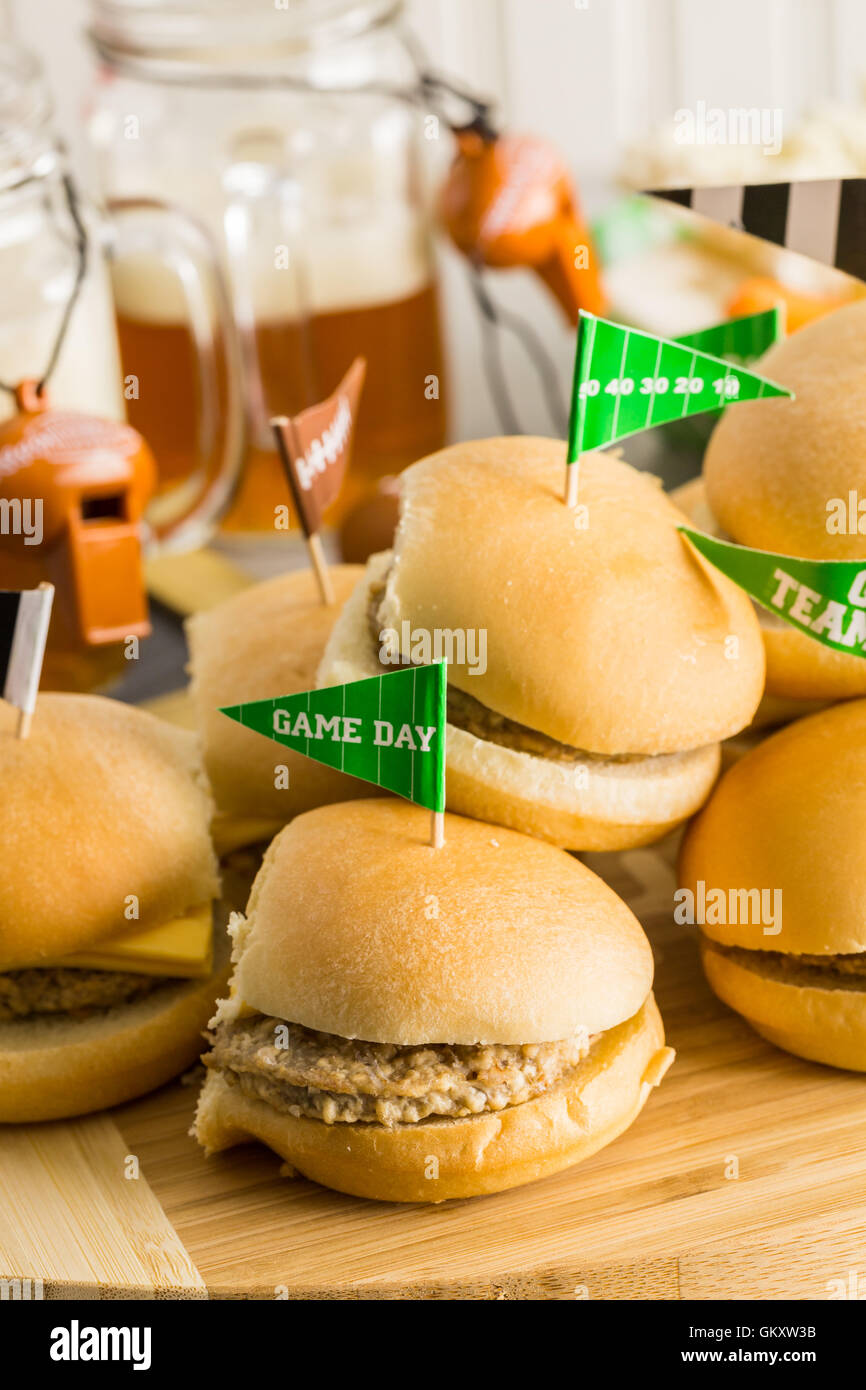 Sliders with veggie tray on the table for the football party Stock ...