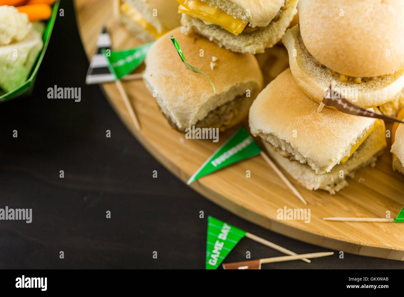 Sliders with veggie tray on the table for the football party Stock ...