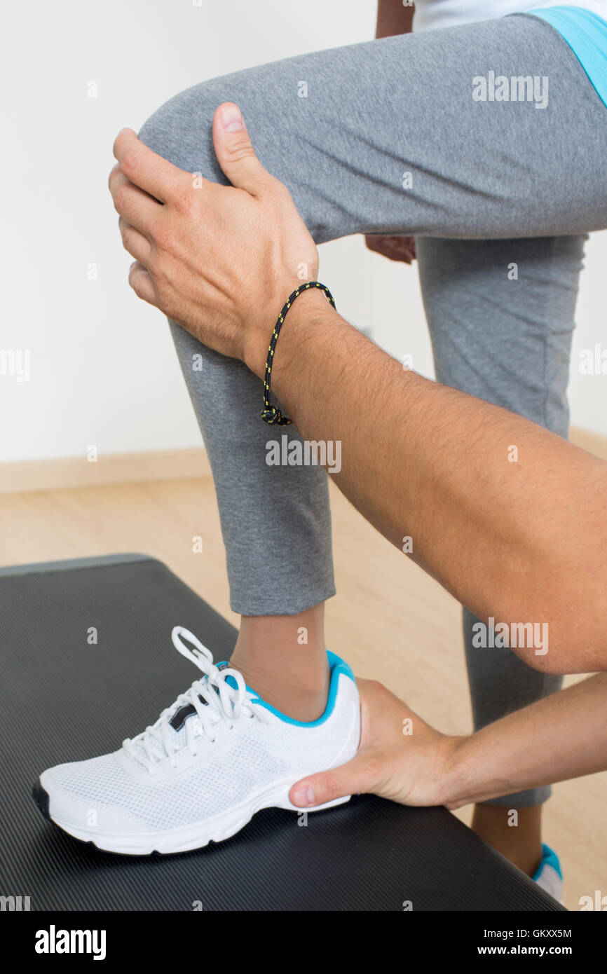 Female coach correct step exercise woman Stock Photo - Alamy