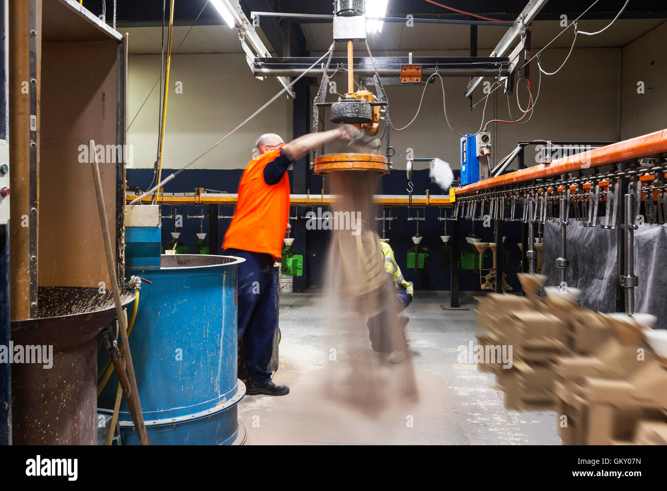 factory workers in a foundery Stock Photo - Alamy