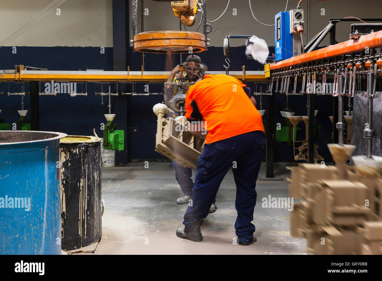 factory workers in a foundery Stock Photo - Alamy
