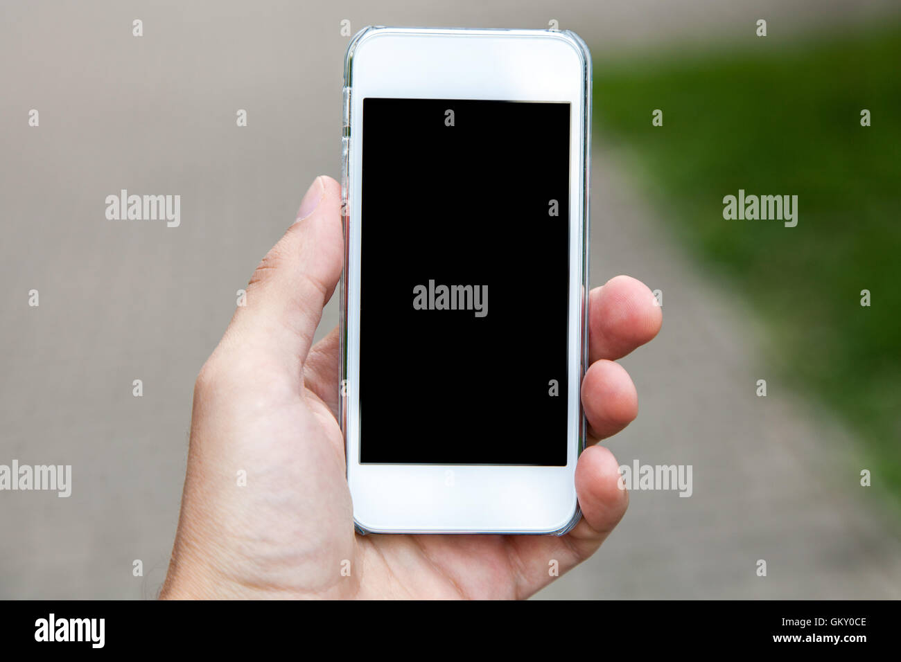 Hand holding smartphone using hi-res stock photography and images - Alamy