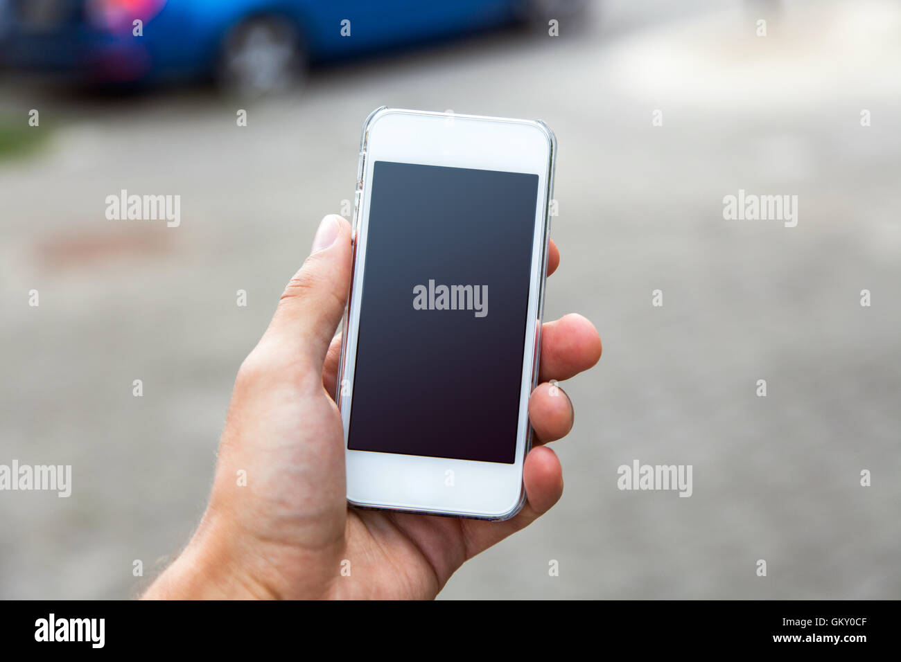 Hand holding smartphone using hi-res stock photography and images - Alamy