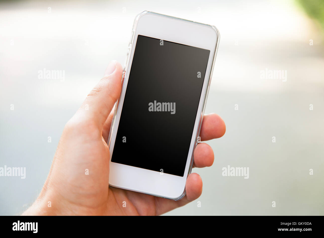 Smartphone in a hand Stock Photo - Alamy