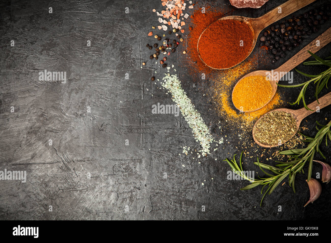 Spice on dark background Stock Photo - Alamy