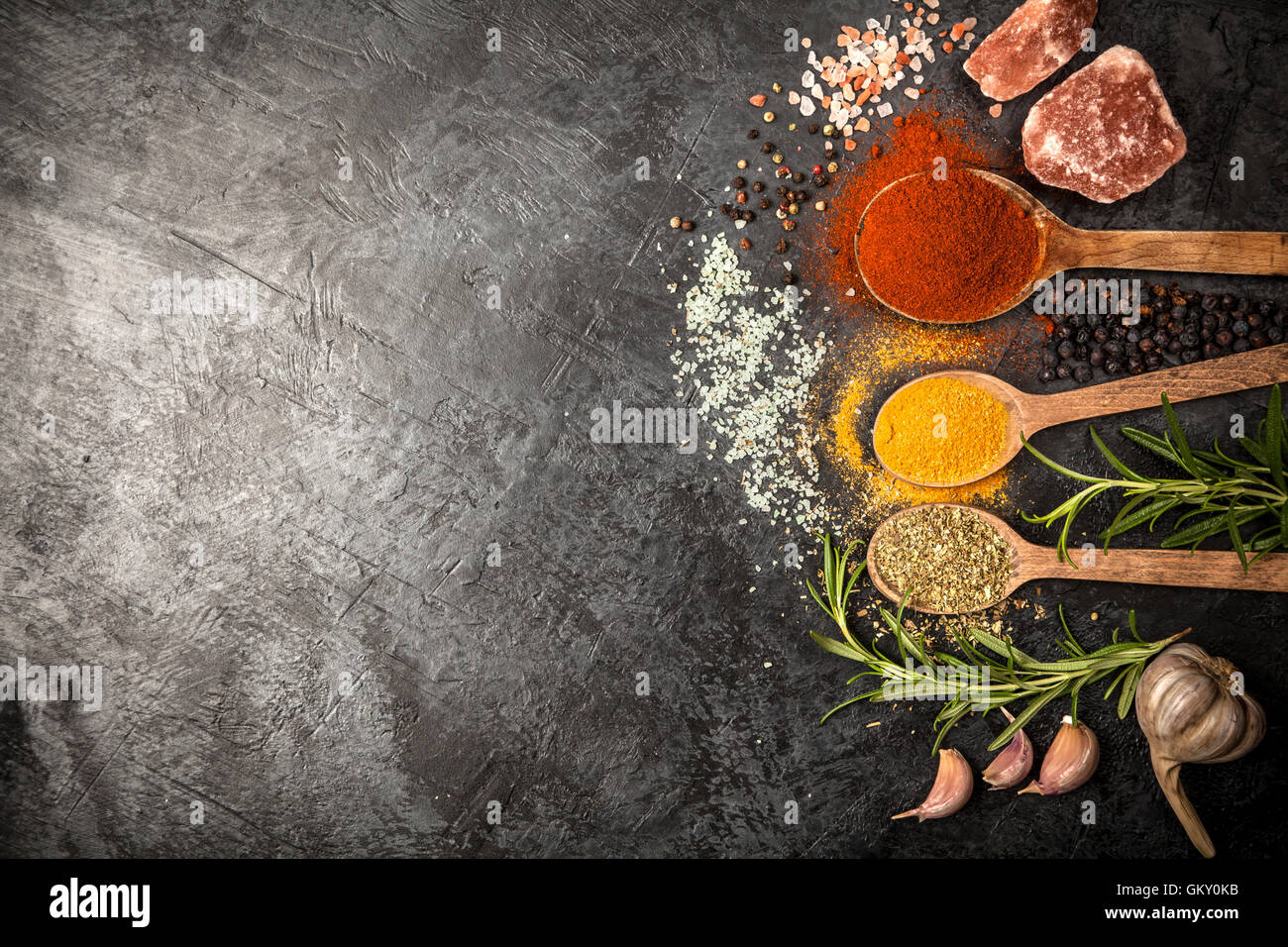 Spice on dark background Stock Photo - Alamy