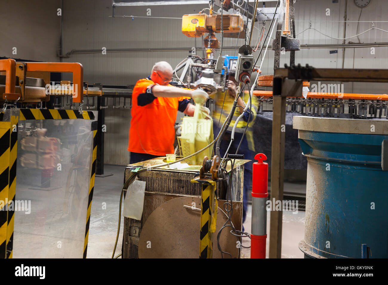 factory workers in a foundery Stock Photo - Alamy