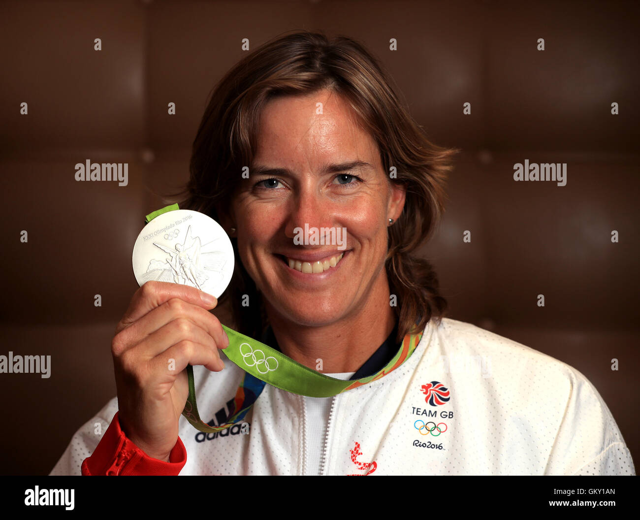 Great Britain's Katherine Grainger poses with her silver medal after a ...