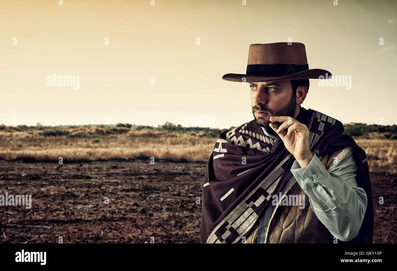 Gunfighter of the wild west with serious and angry expression Stock ...