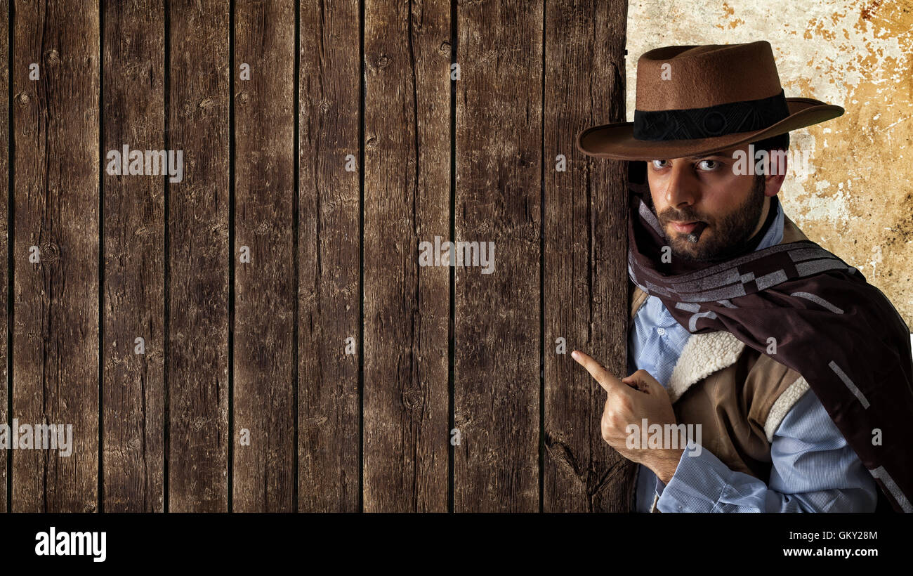 Cowboy gunslinger pointing gun hi-res stock photography and images - Alamy