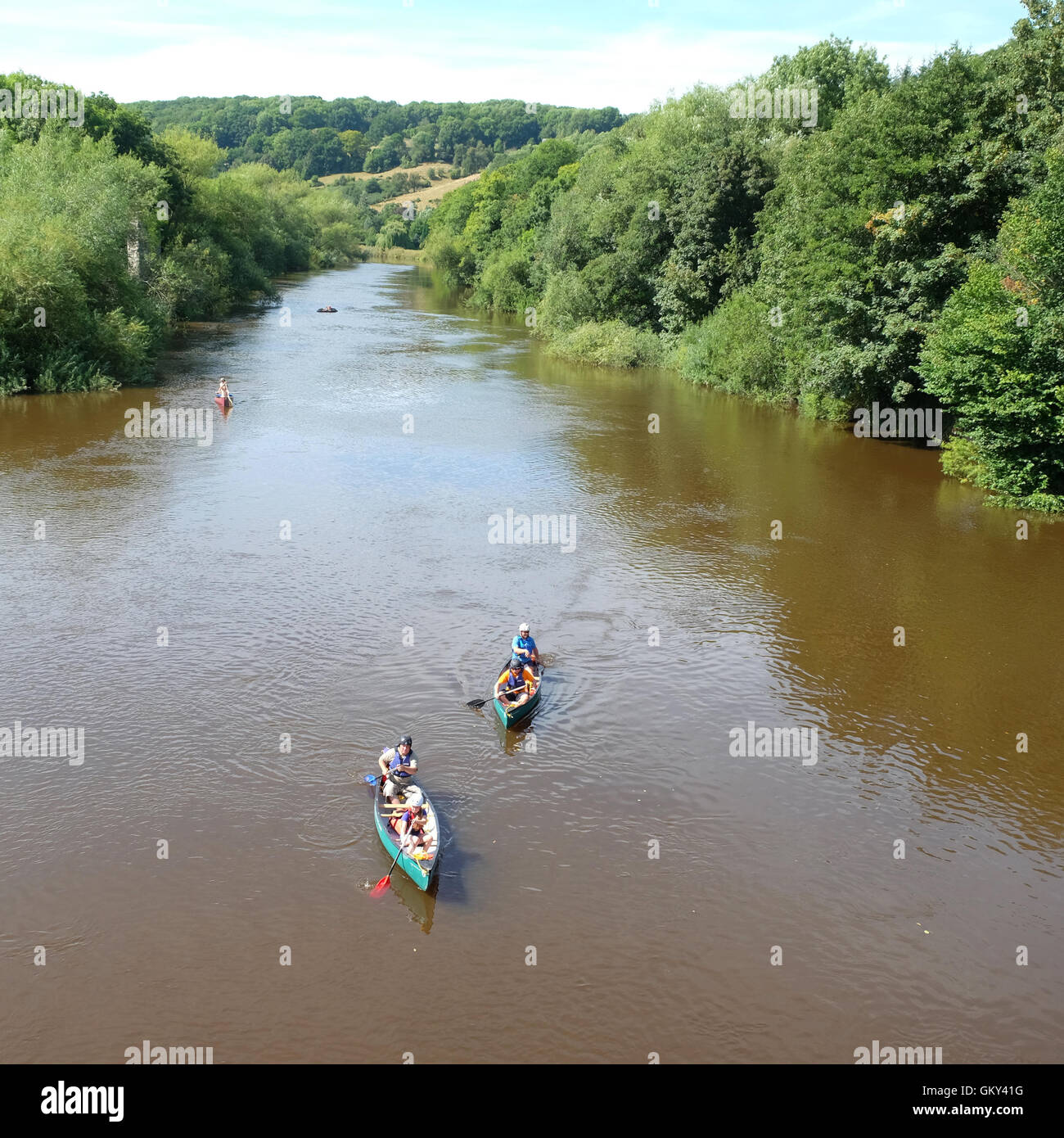 Whitney on Wye, Herefordshire, UK August, 2016. Canoes paddle ...